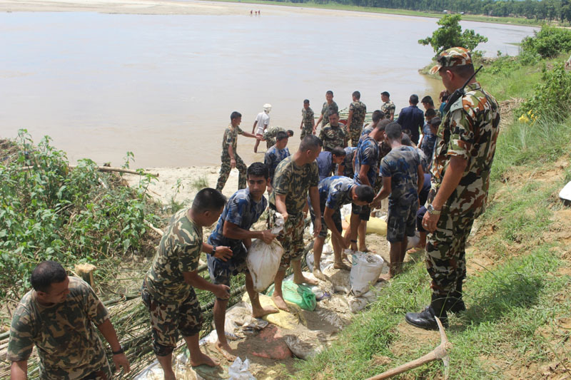 Security personnel repair damaged dam - The Himalayan Times - Nepal's ...